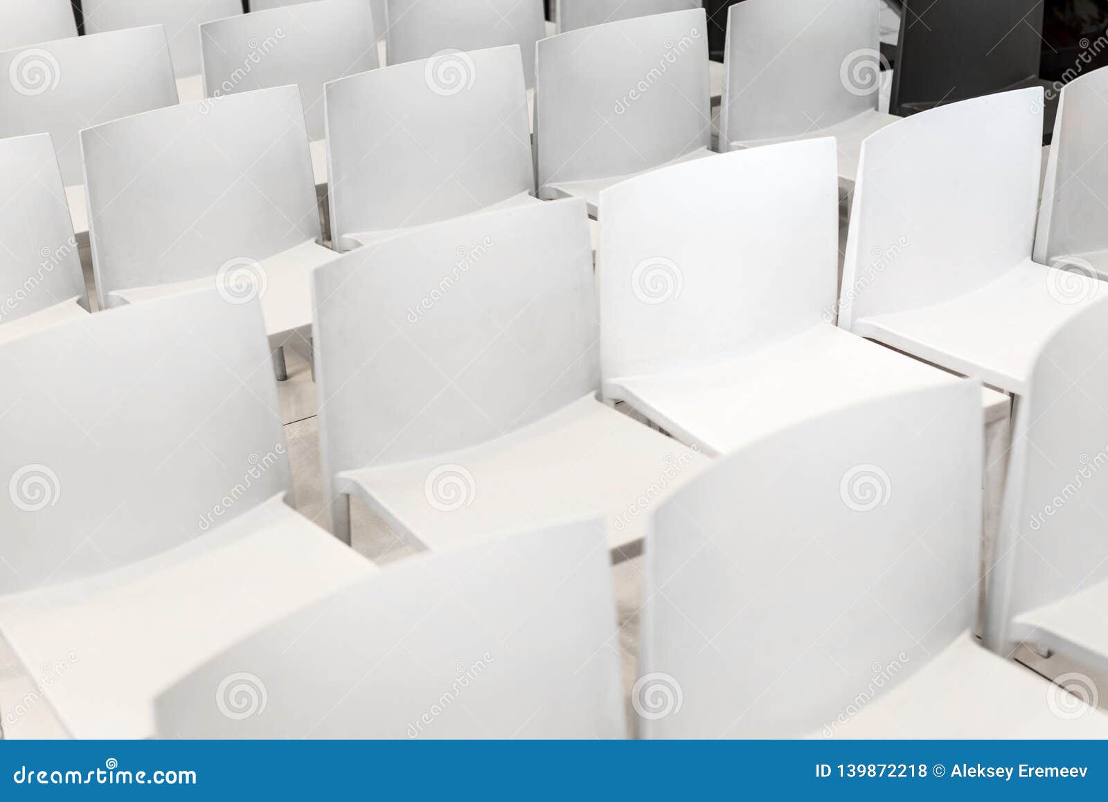Many White Chairs Stand in Several Rows Stock Photo - Image of indoor ...