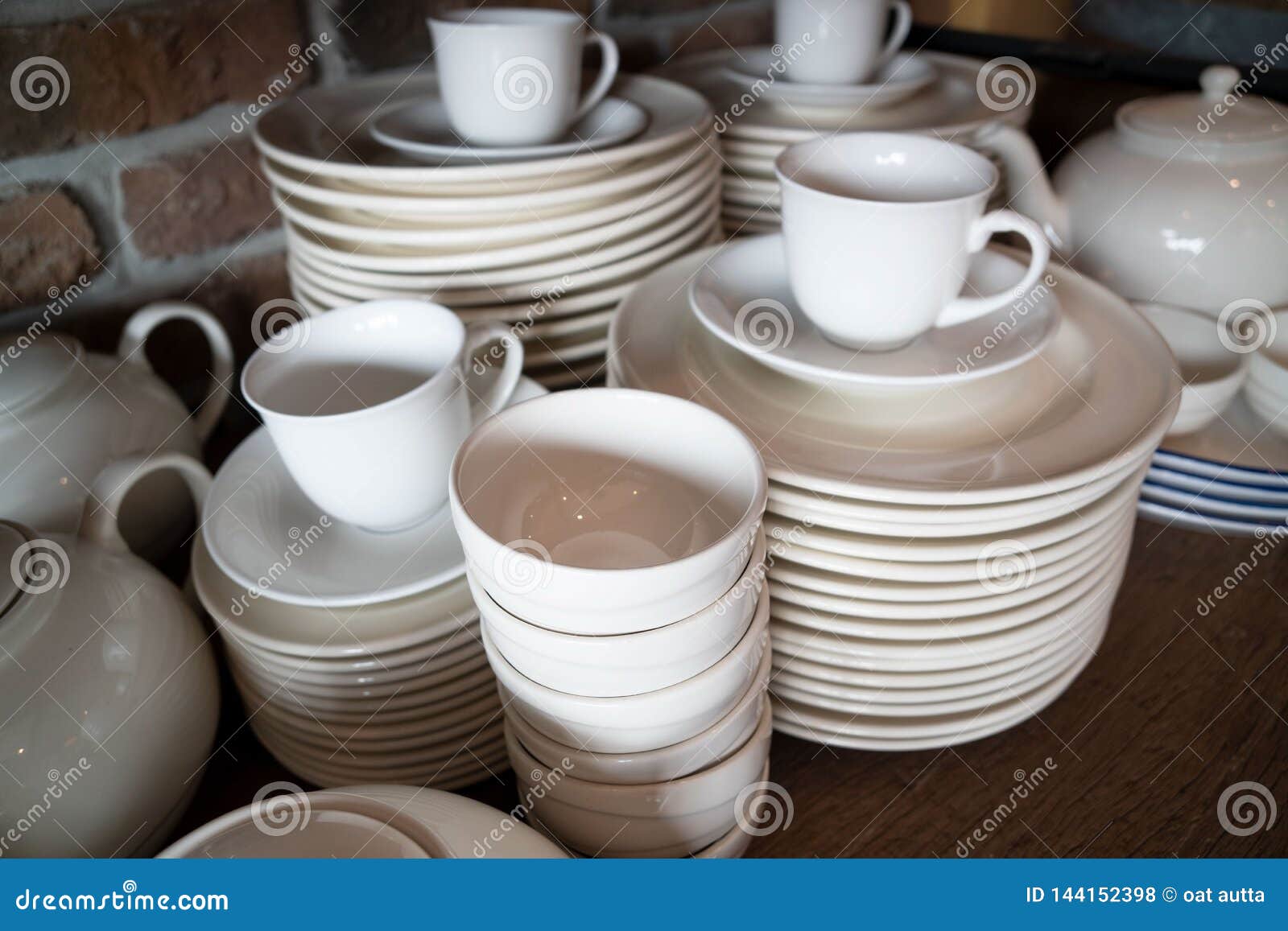 Many White Plates are Stacked Together.a Stack of White Dish Stock ...