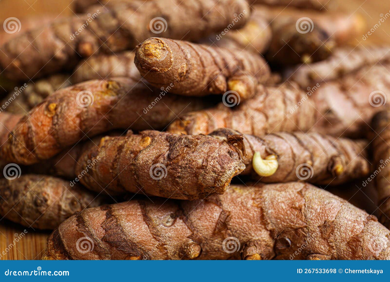 Many Whole Turmeric Roots on Wooden Table Stock Photo - Image of flavor ...