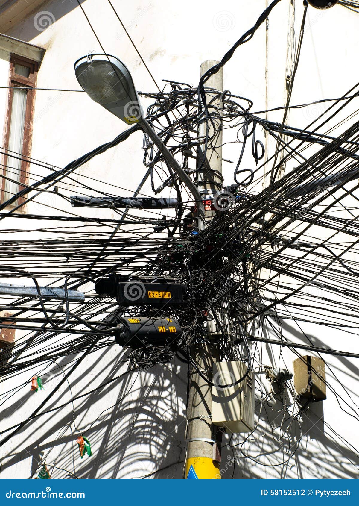 Many wires on an lamp post stock photo. Image of industrial - 58152512