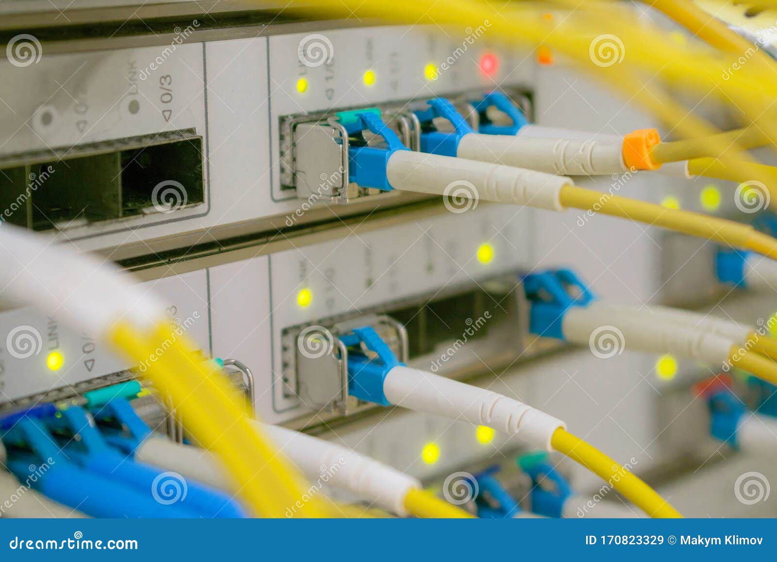 Many Yellow Internet Cables. Front Panel of the Central Router with a ...
