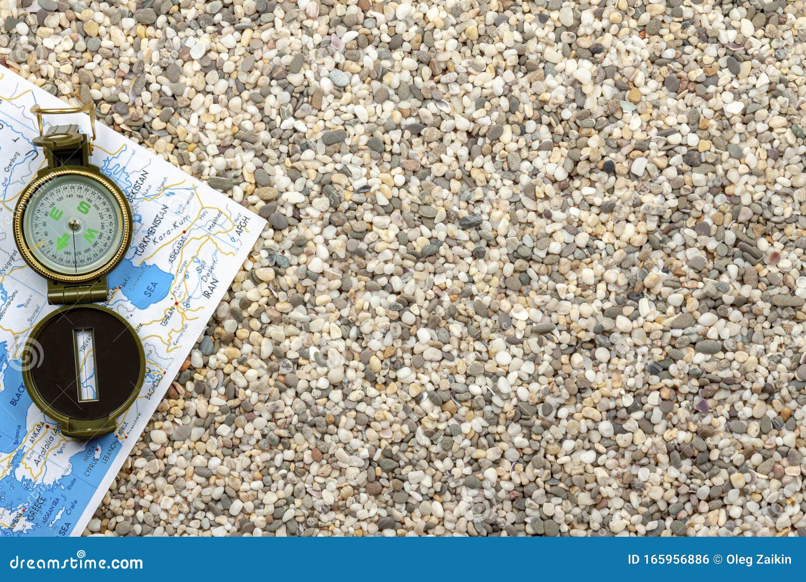 A Map with a Compass Lies on the Sea Sand. Stock Photo - Image of north ...