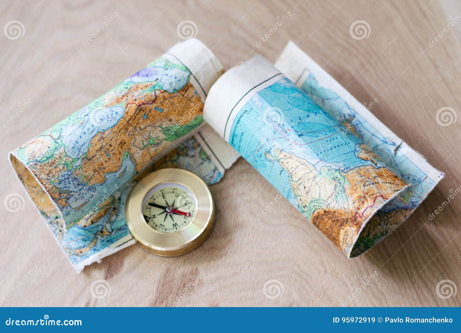 Map and Compass Lying on the Wooden Background Stock Image - Image of ...