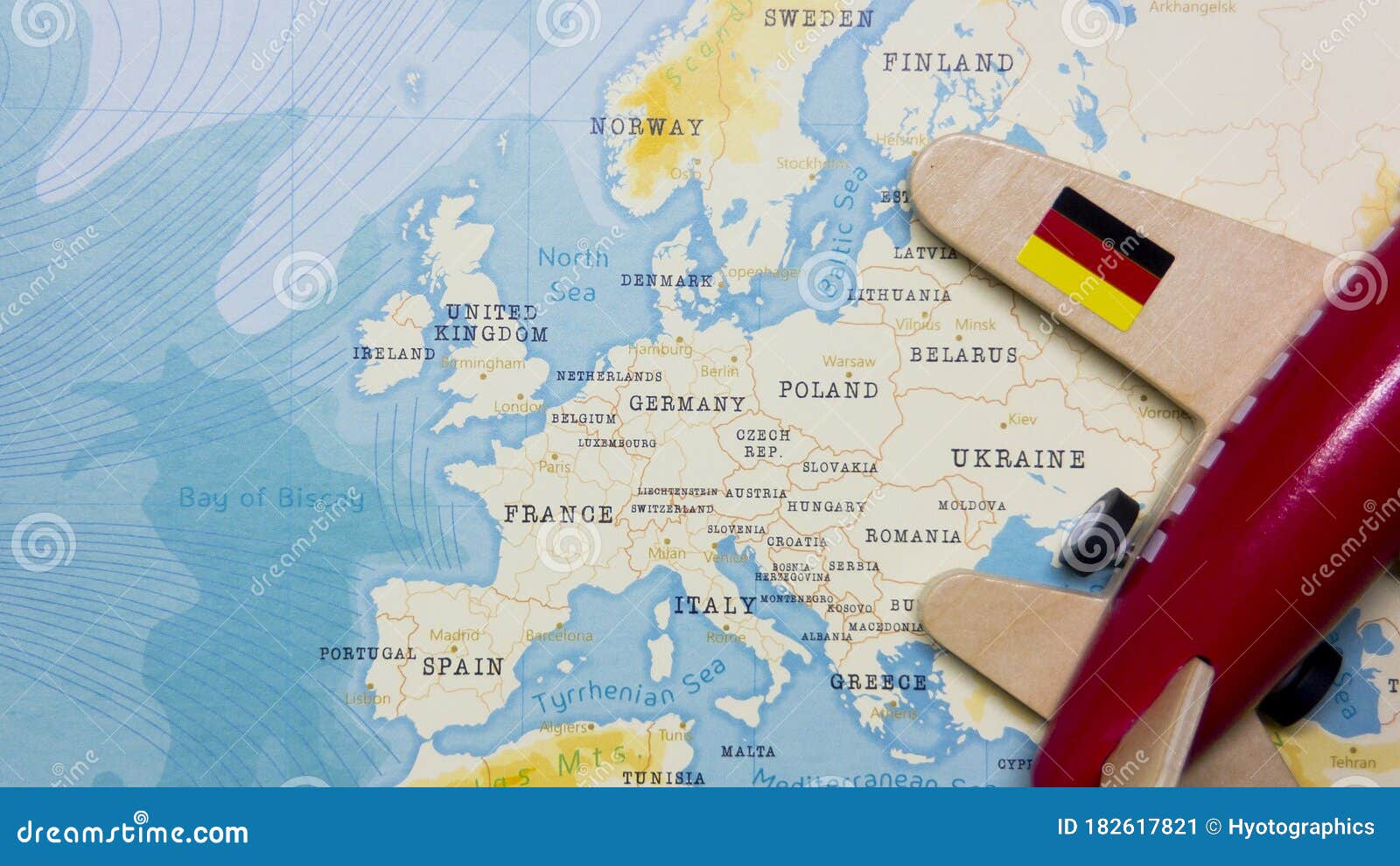 A Map of Germany and a Red Plane with a Flag of Germany Attached To Its ...
