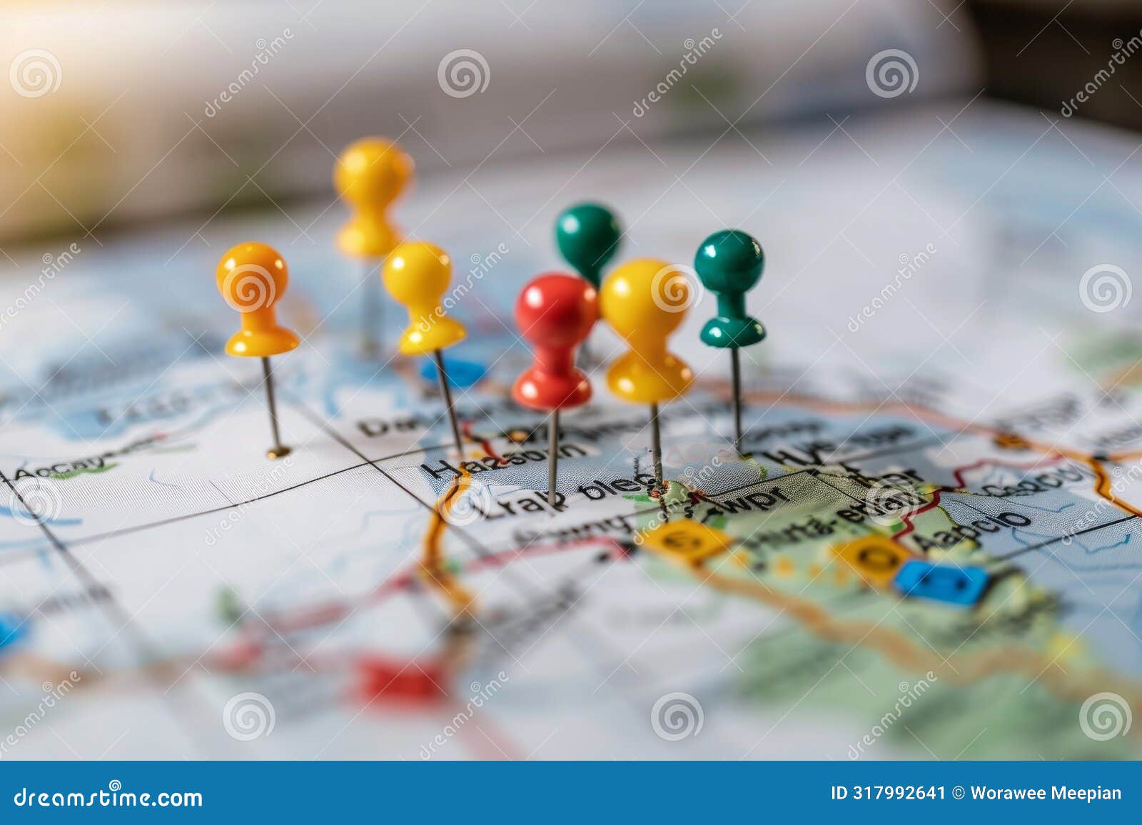 A Map with Many Pins on it, Some of Which are Yellow, Red, and Green ...