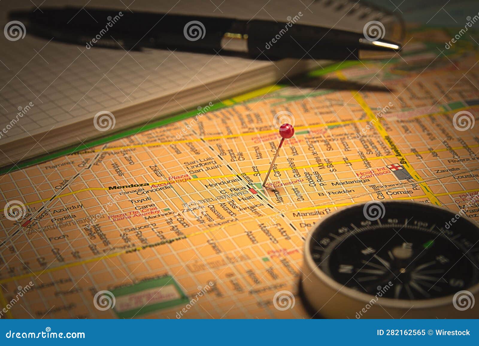 Compass Notebook And Pencil Laid On A Paper Map. Royalty-Free Stock ...