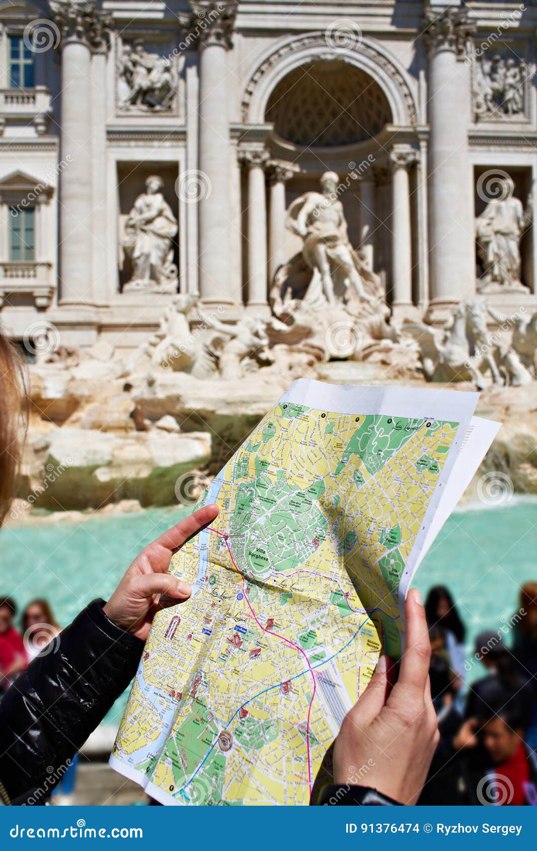 Map of Rome in Hands Tourist and Trevi Fountain Stock Photo - Image of ...