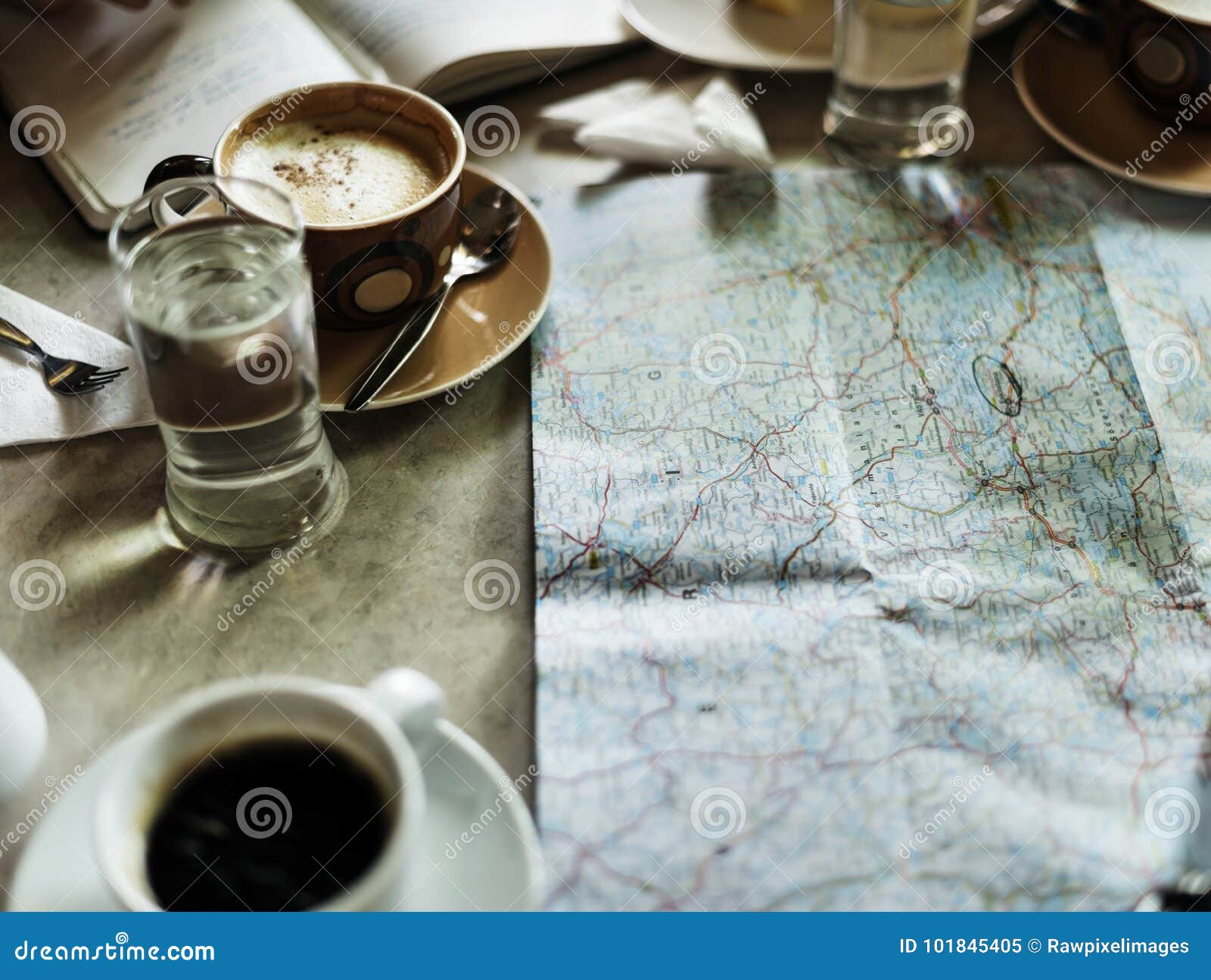 A map and some coffee cups stock image. Image of lifestyle - 101845405