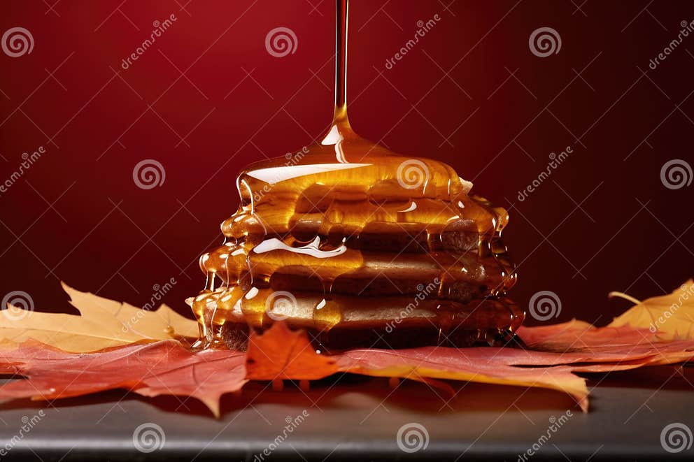 Maple Syrup Dripping Onto a Stack of Pancakes Stock Photo - Image of ...