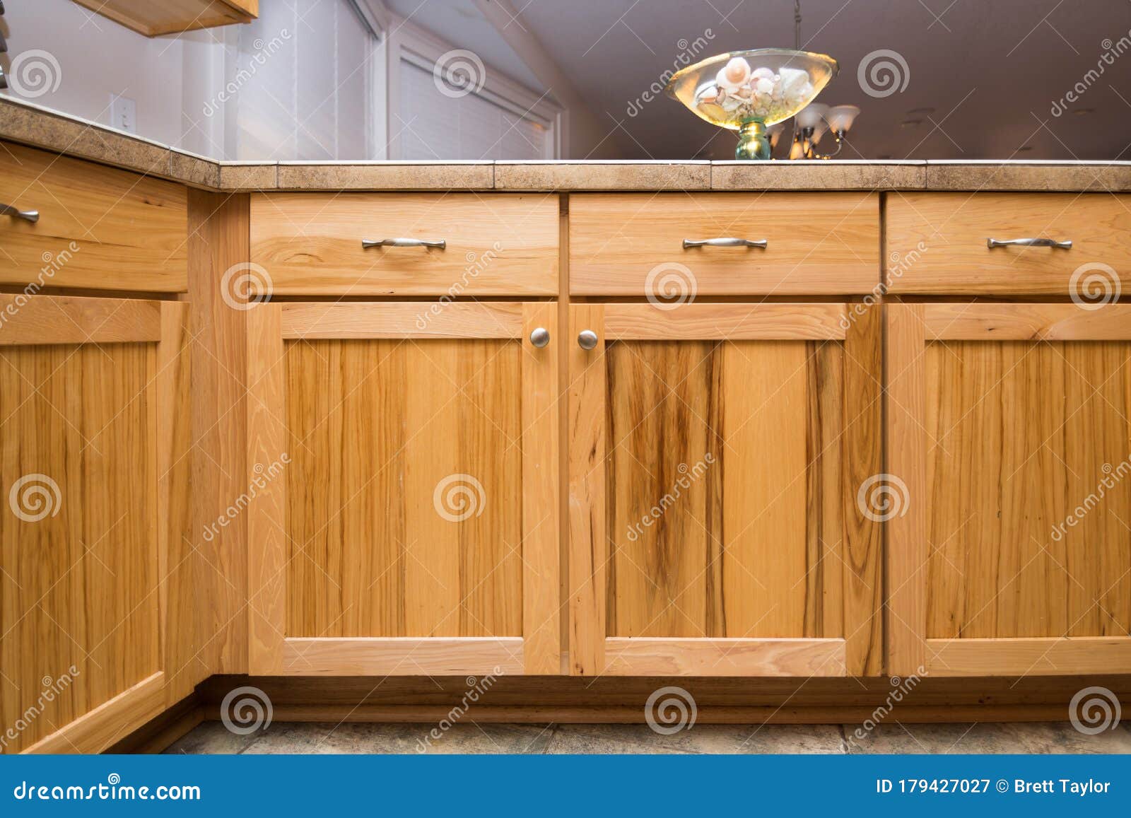 Maple wooden cabinets stock image. Image of texture - 179427027