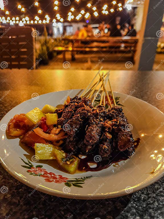 A Plate of Maranggi Satay is Served on the Table in an Attractive ...