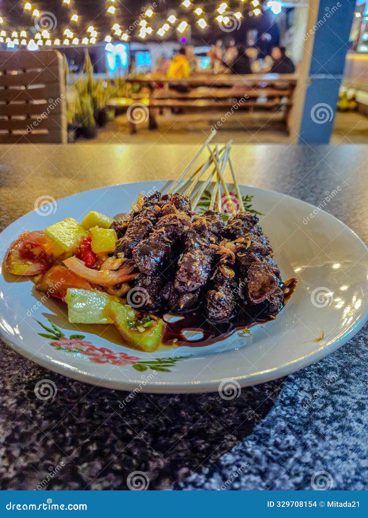 A Plate of Maranggi Satay is Served on the Table in an Attractive ...