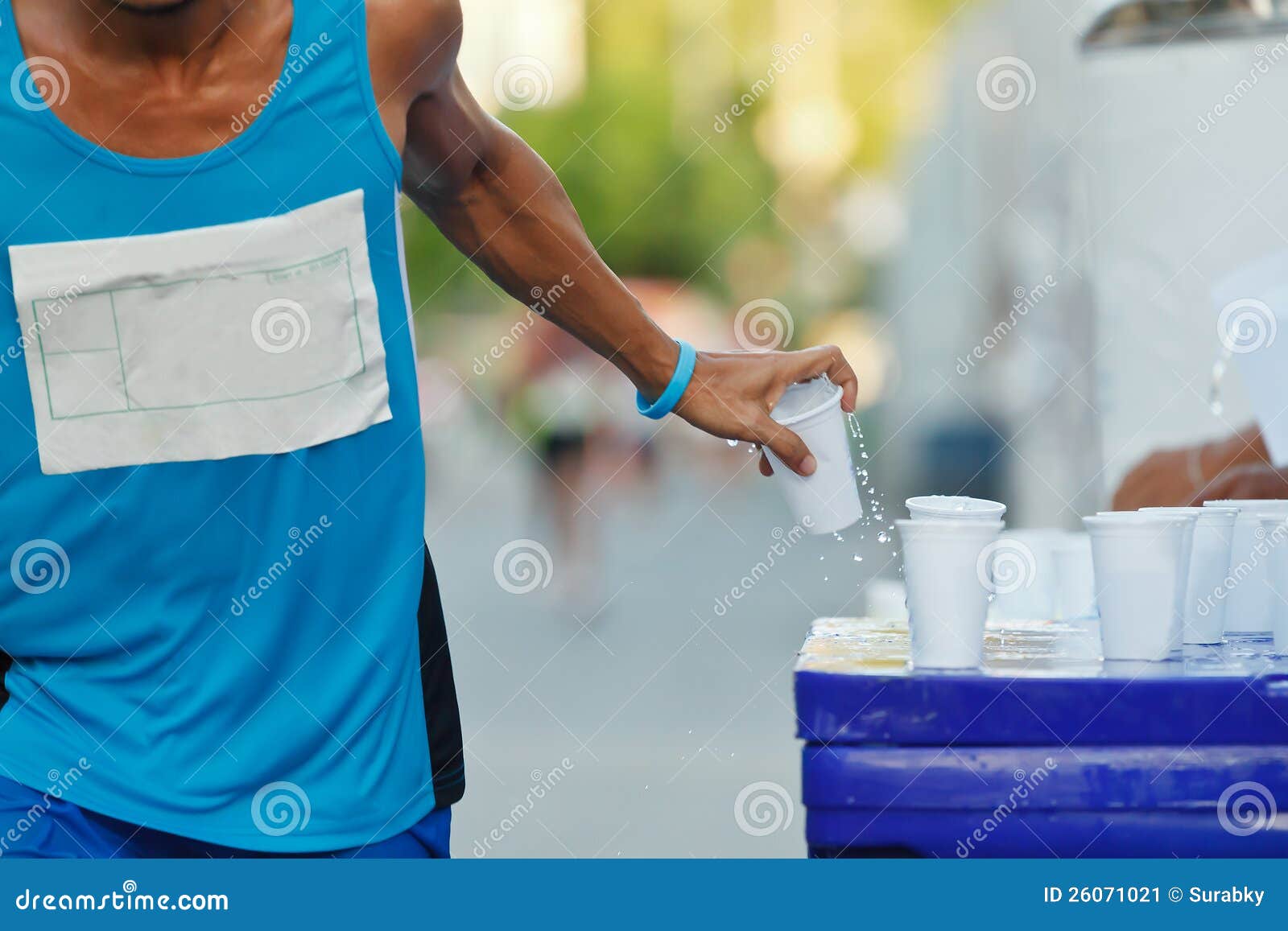 Marathon Racer Catching Cup of Water Stock Image - Image of outside ...