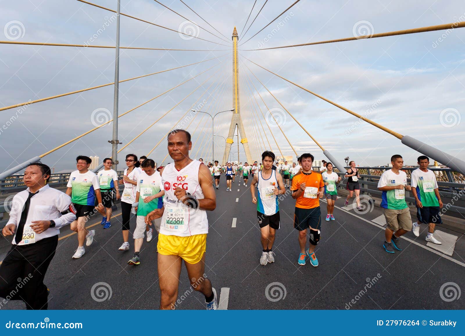 Marathon runner on bridge editorial stock image. Image of athletic ...
