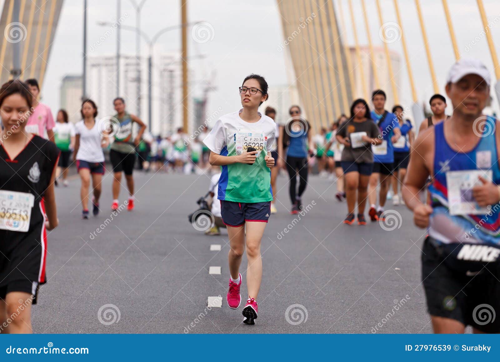 Marathon runner on street editorial stock image. Image of adults - 27976539