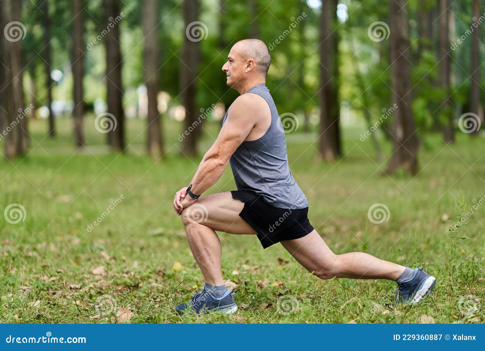 Marathon Runner Stretching and Warming Up Stock Image - Image of ...