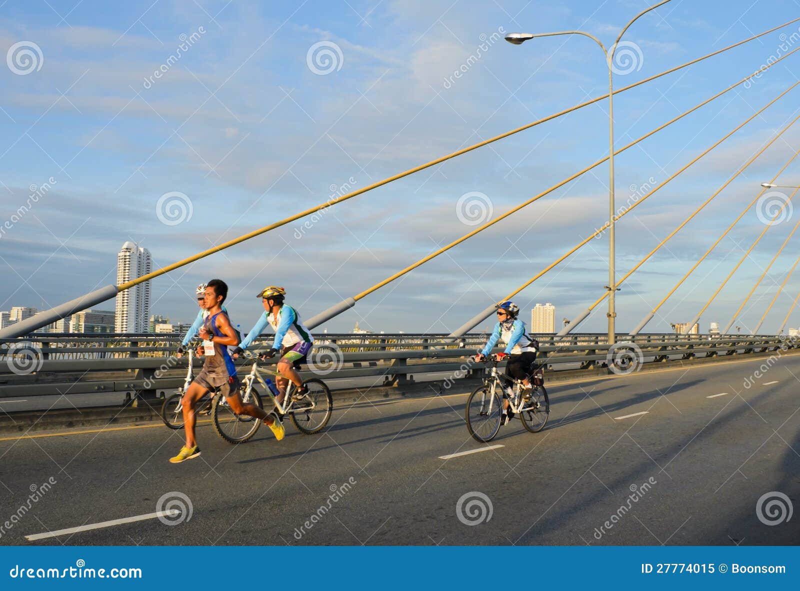 Marathon Runners Across Cable Bridge Editorial Image - Image of athlete ...