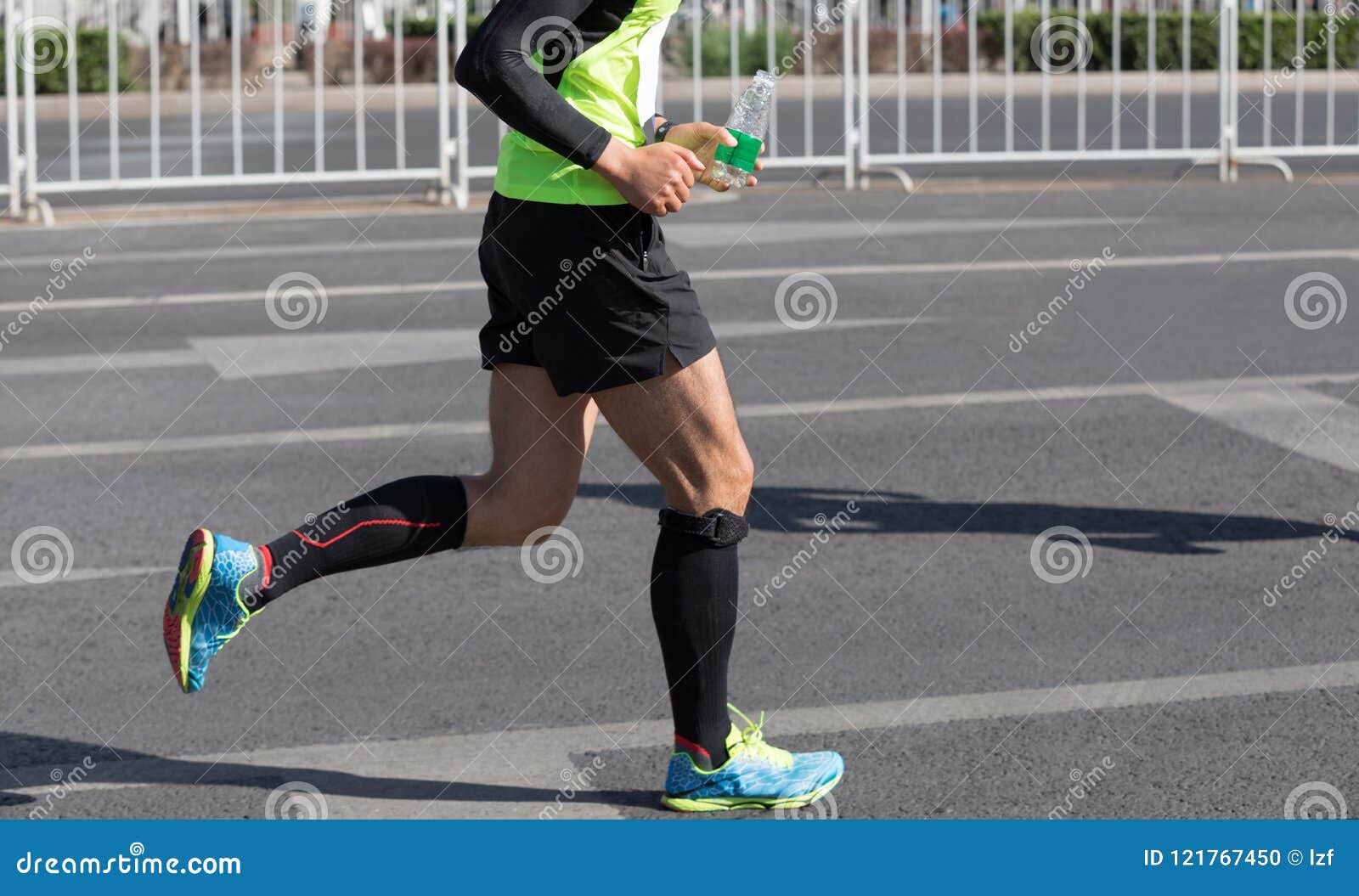 Marathon Runners Legs Running on City Stock Photo - Image of ...