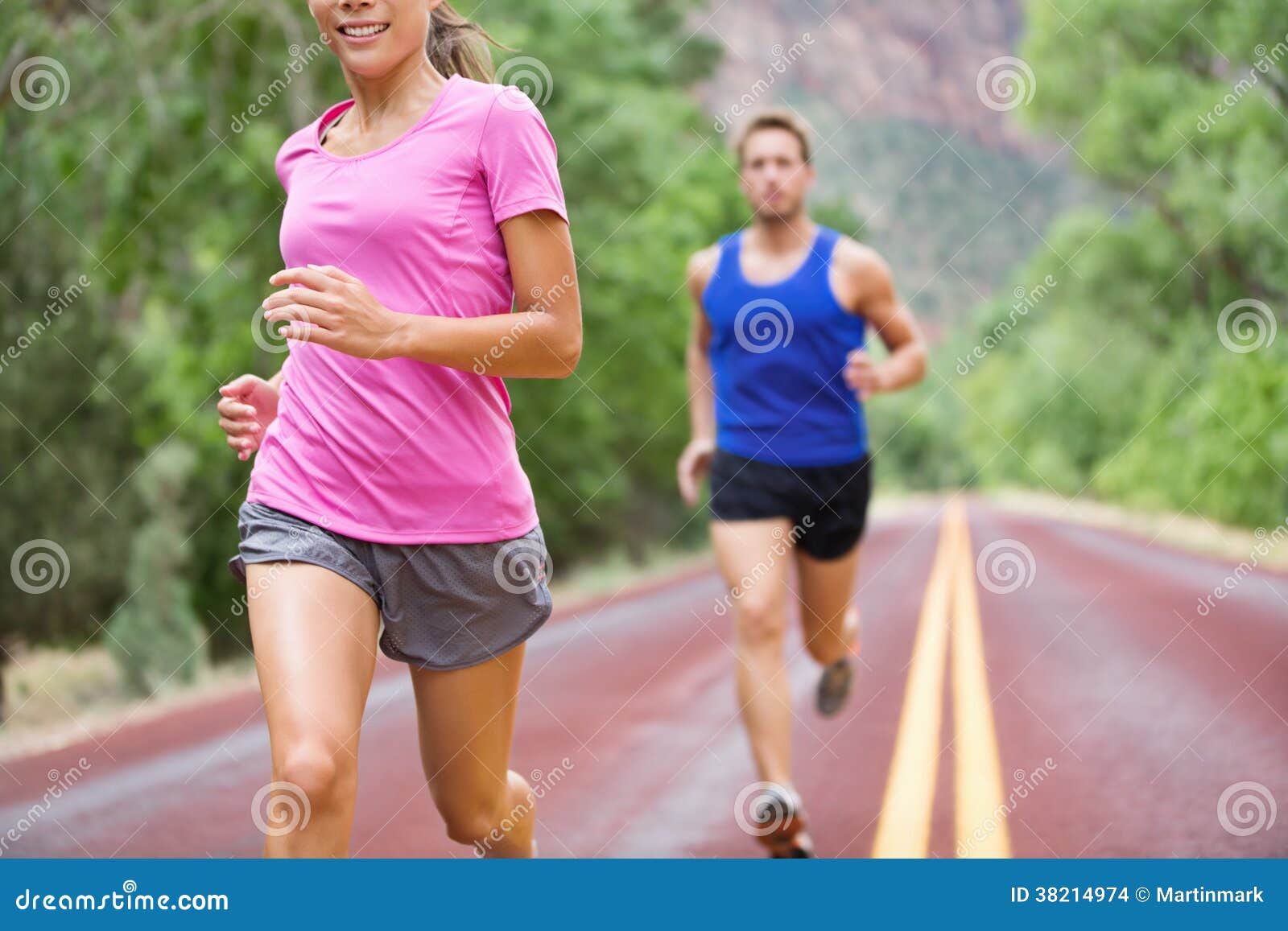 Marathon Running Athletes Couple Training on Road Stock Photo - Image ...