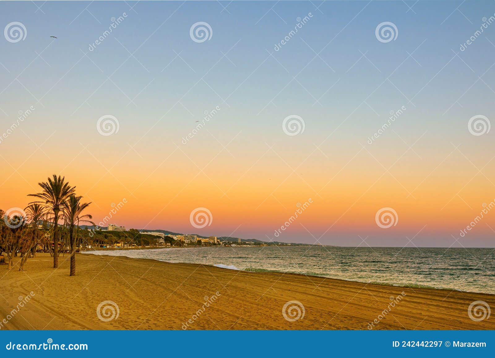 Marbella beach in sunset stock image. Image of light - 242442297