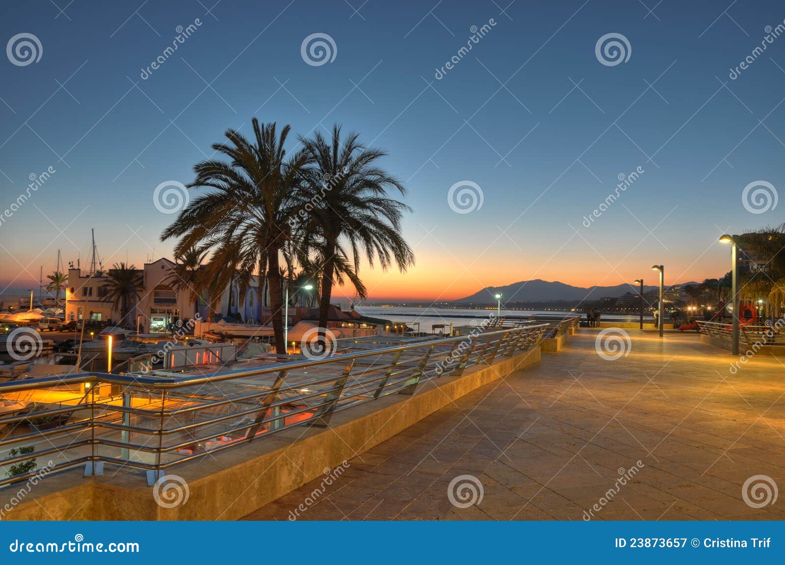 Marbella Harbor and Cliff at Sunset Stock Image - Image of touristic ...