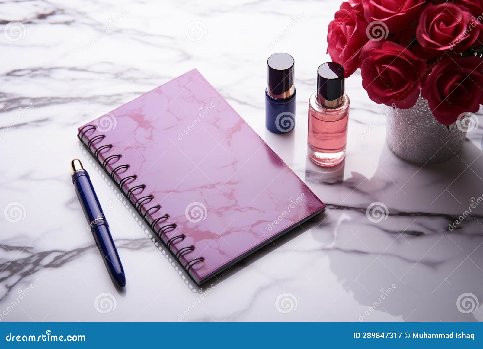 On Marble, a Notepad, Pen, and Nail Polish Create a Stylish Tableau ...