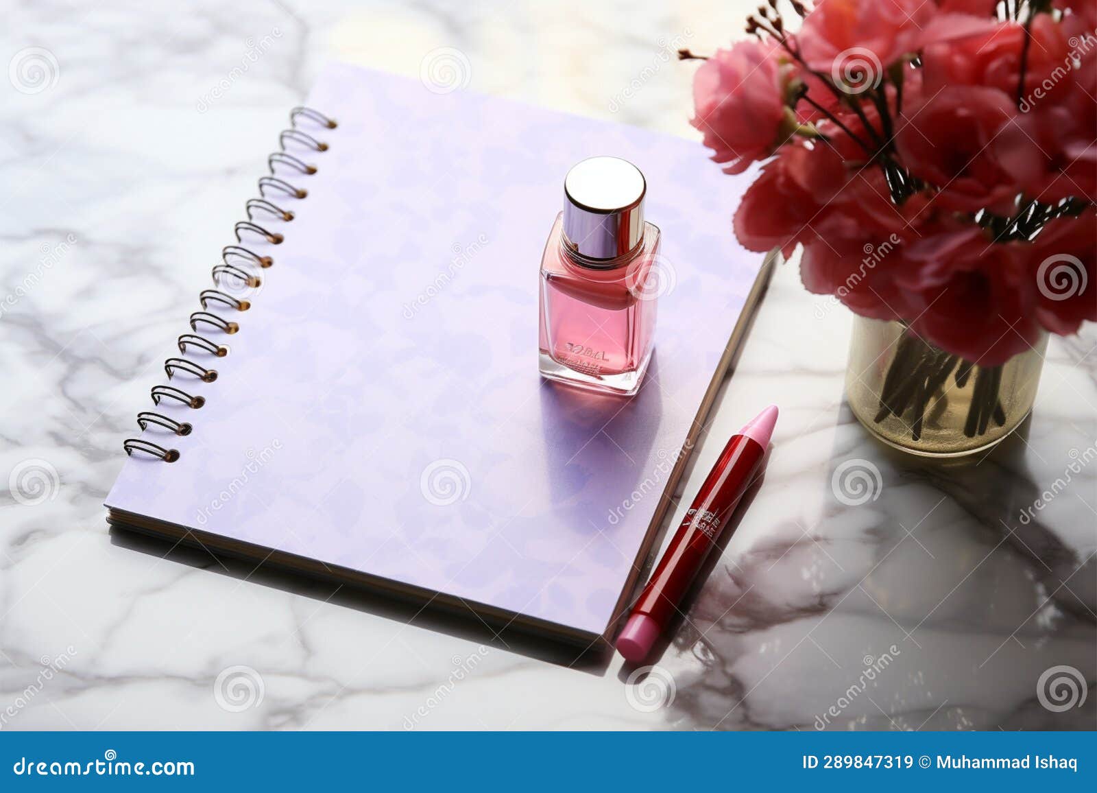 On Marble, a Notepad, Pen, and Nail Polish Create a Stylish Tableau ...