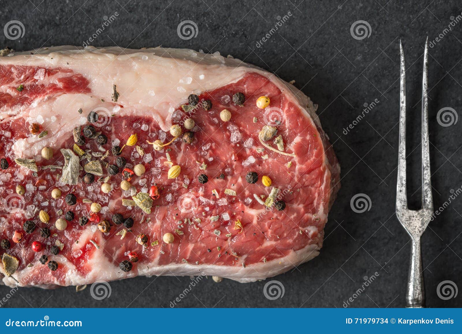 Marble Ribeye Steak, Pepper, Sage, Fork on Blue-black Slate Stock Photo ...