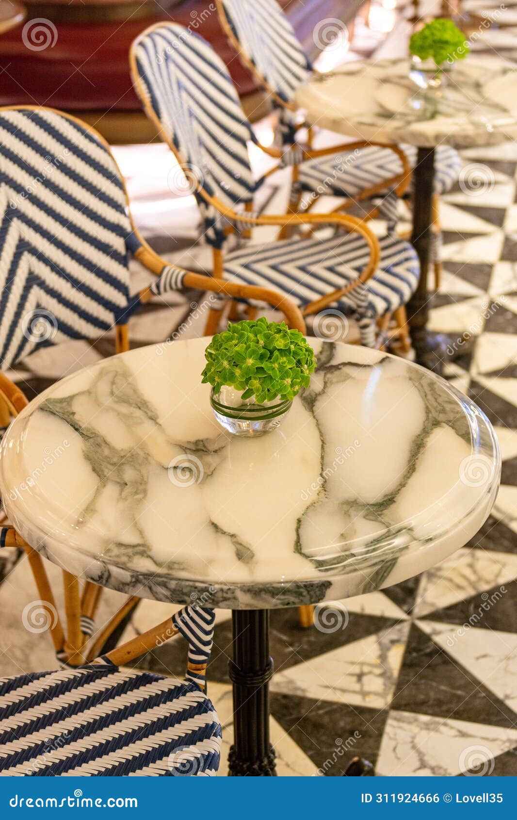 Marble Round Table in a French Looking Cafe Stock Photo - Image of ...