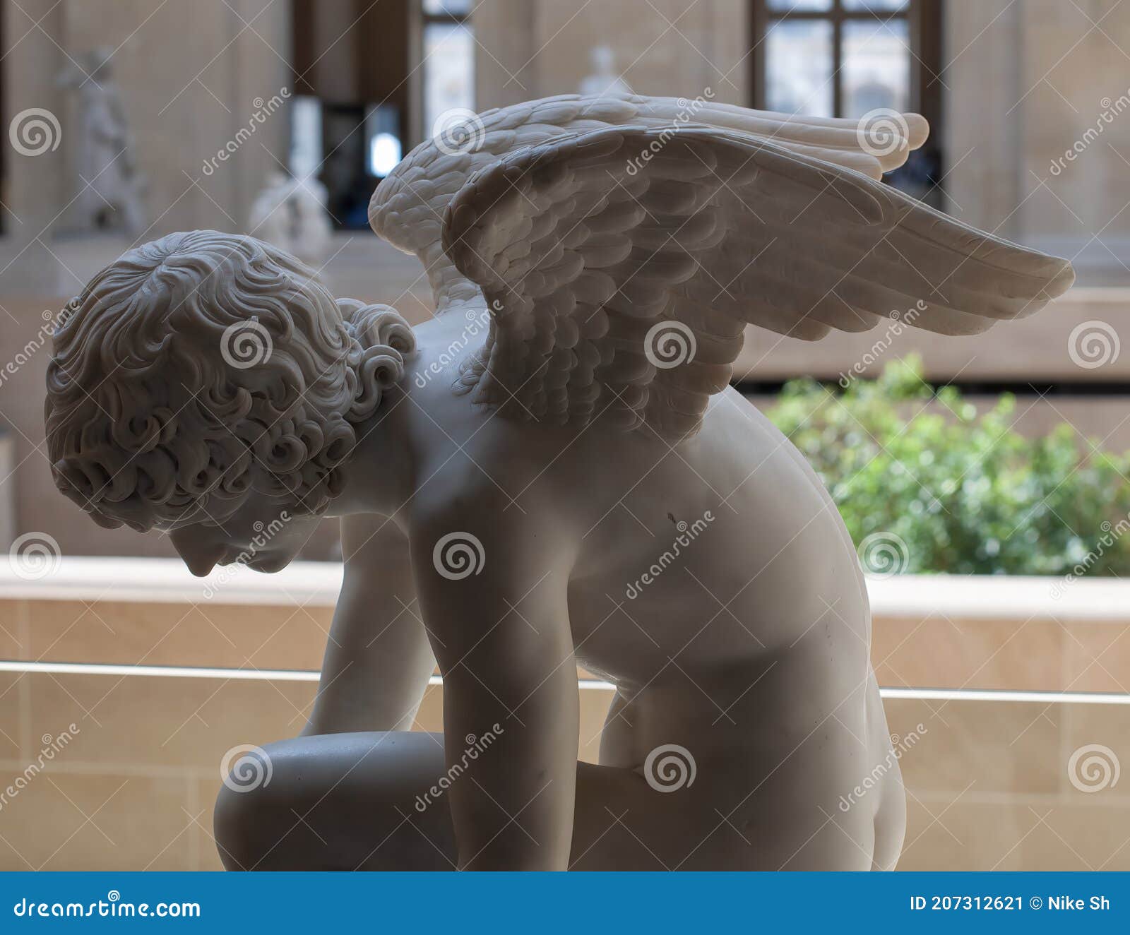 Statue of Cupid, Louvre Museum, Paris Editorial Photo - Image of marble ...