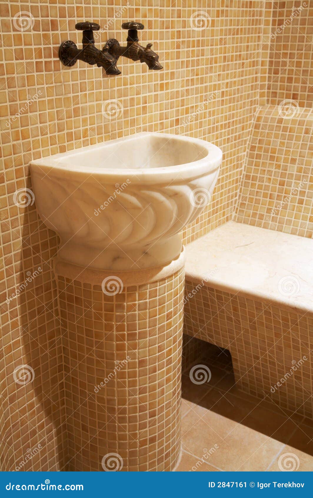 Marble Sink In A Public Restroom With Retro Golden Water Tap With ...