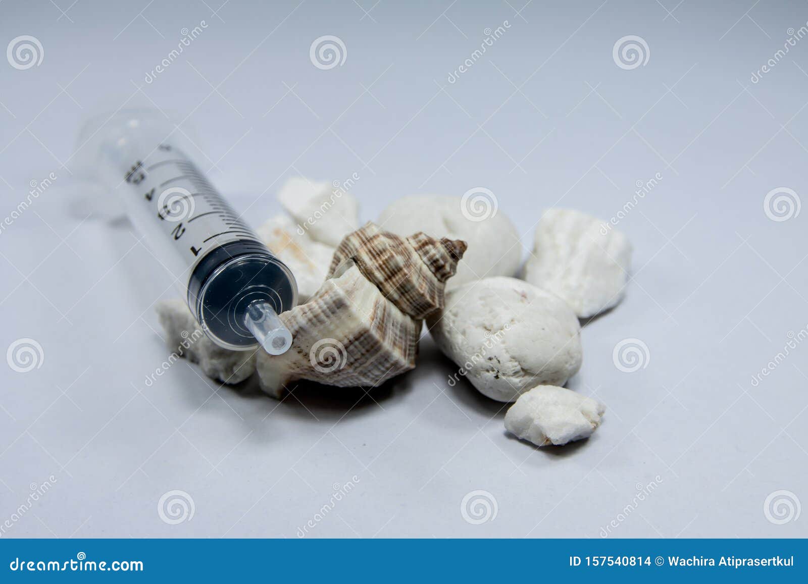 Marble Stone Shell Syringe Objects on the White Background Stock Photo ...