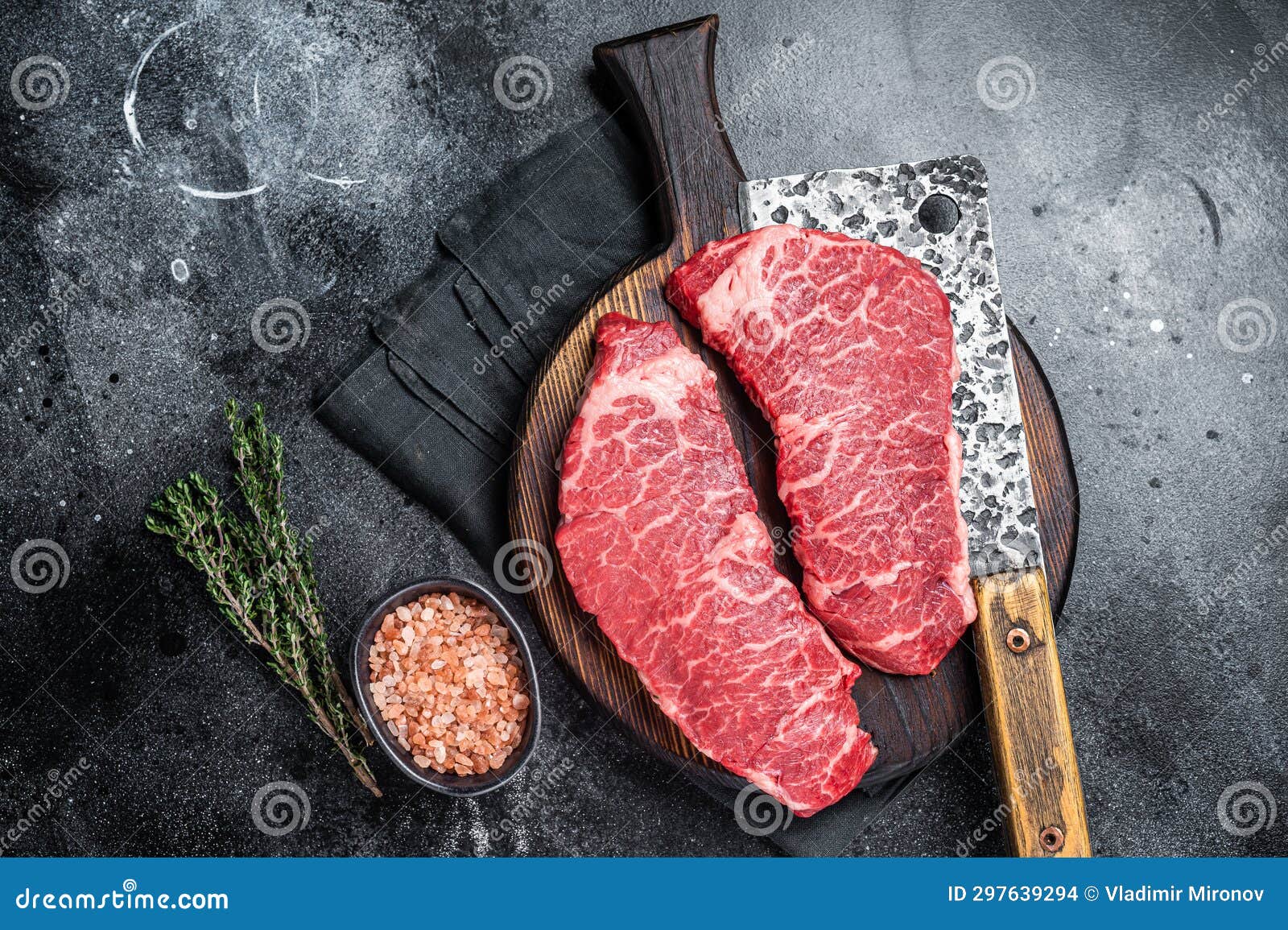 Marbled Beef Denver Raw Meat Steak with Herbs. Black Background Stock ...