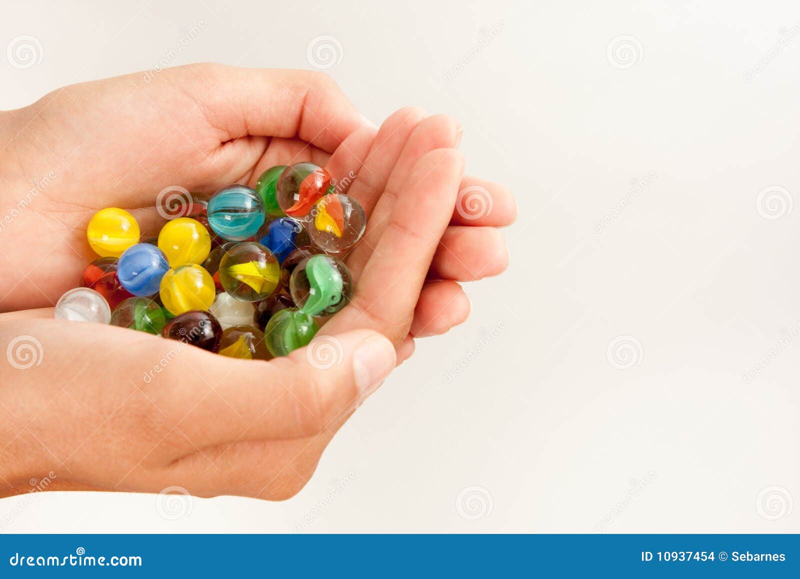 Marbles in Hands stock photo. Image of round, caucasian - 10937454