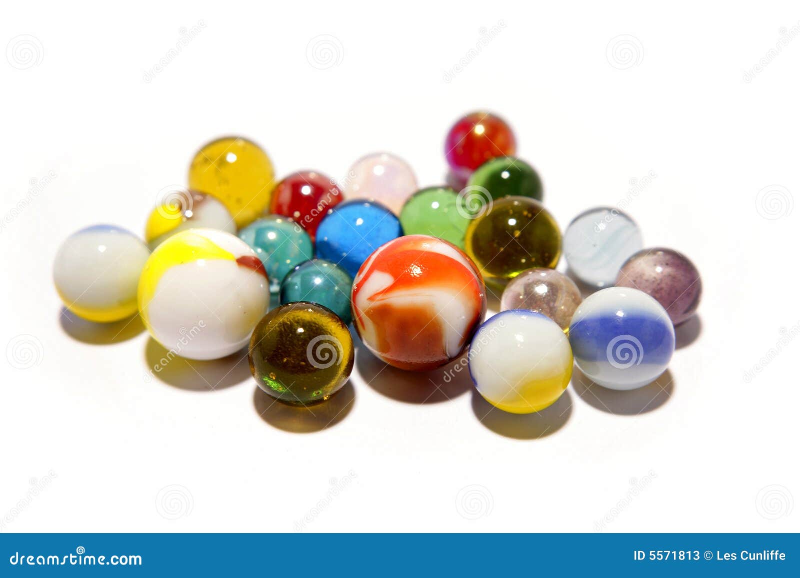Marbles on white stock image. Image of childhood, colour - 5571813