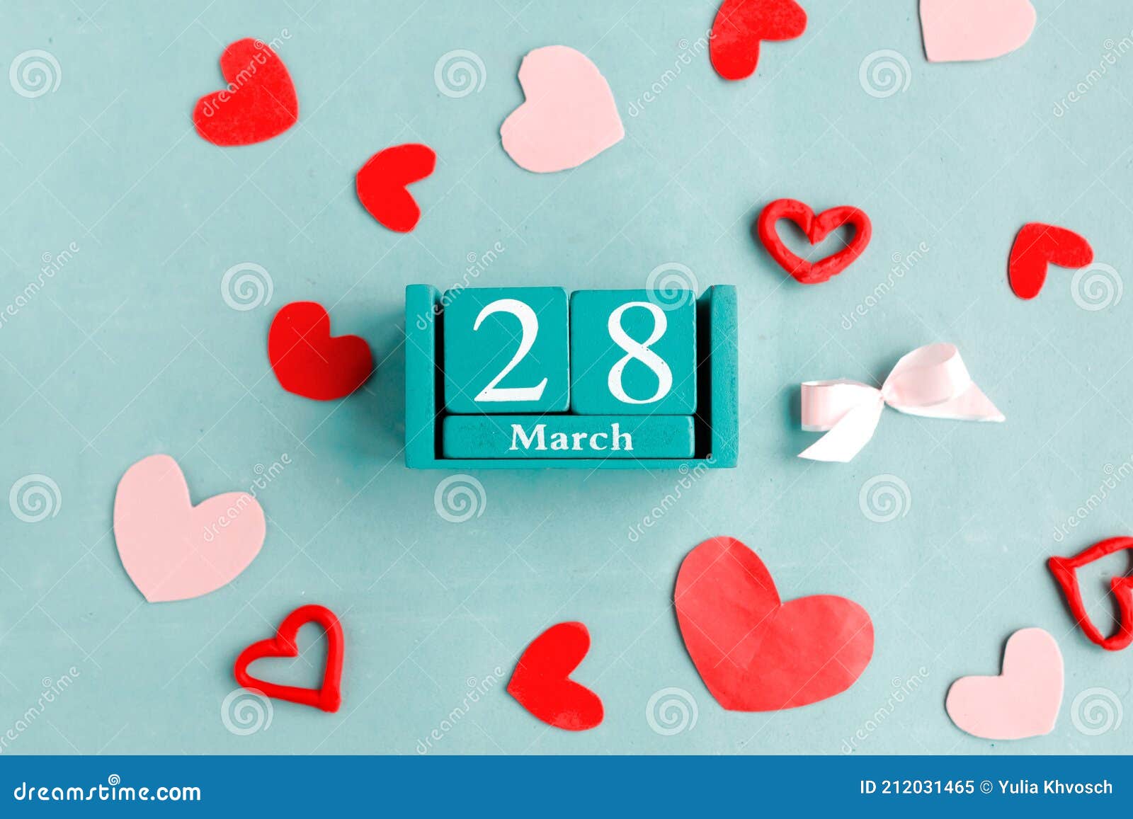 March 28. Blue Cube Calendar with Month Date on Blue Pastel Background ...