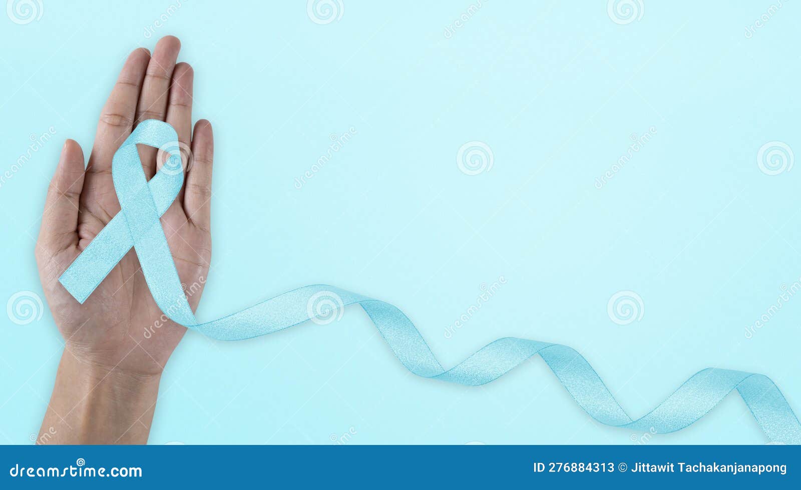 March Colorectal Cancer Awareness Month Man Holding Blue Ribbon For