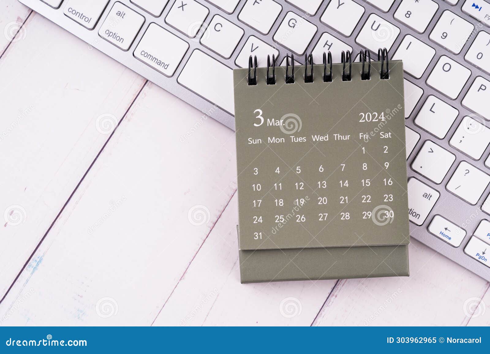 March 2024 Desk Calendar on Top of Computer Keyboard Stock Image ...