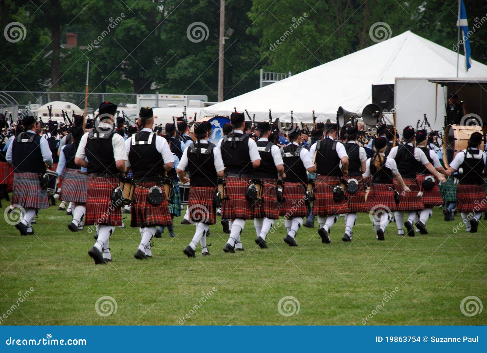 Marching single file editorial stock image. Image of pipe - 19863754