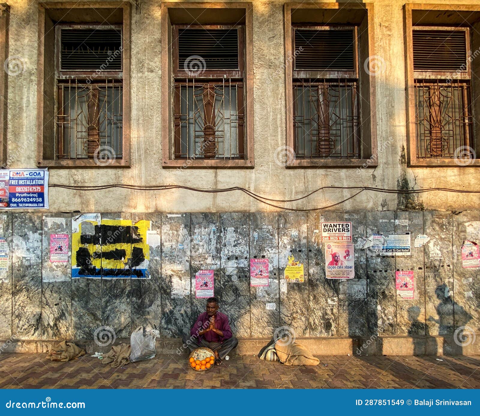 Exterior Facade of an Old Grungy Building with Rectangular Windows in ...