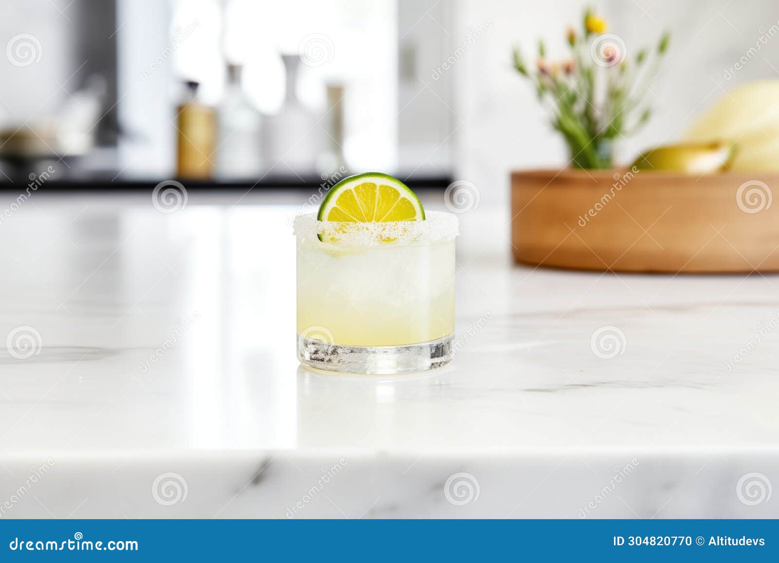 Margarita with Lime Wheel Garnish on Modern White Counter Stock Photo ...
