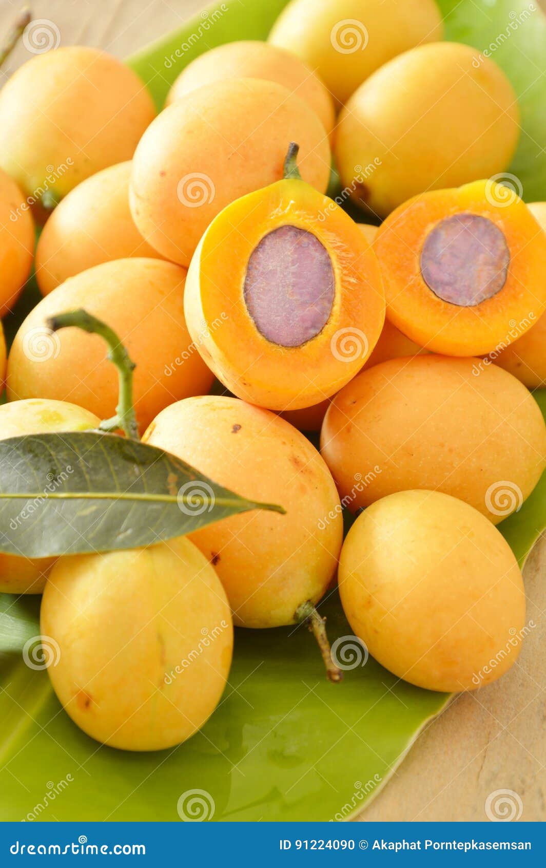 Marian Plum Tropical Fruit Produced in Summer Half Cut on Banana Leaf ...