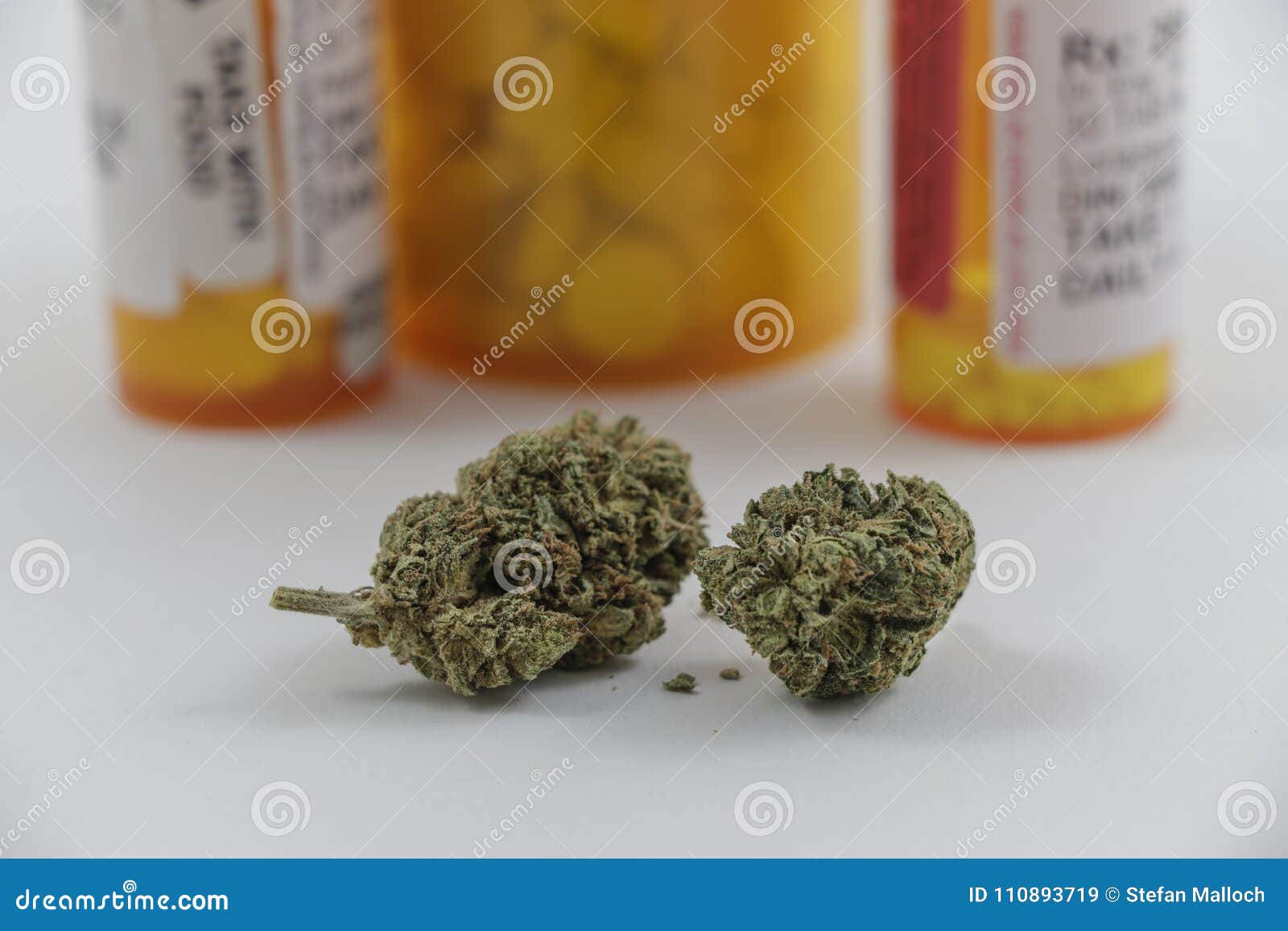 Marijuana Buds with Pill Bottles Behind Stock Image - Image of drug ...