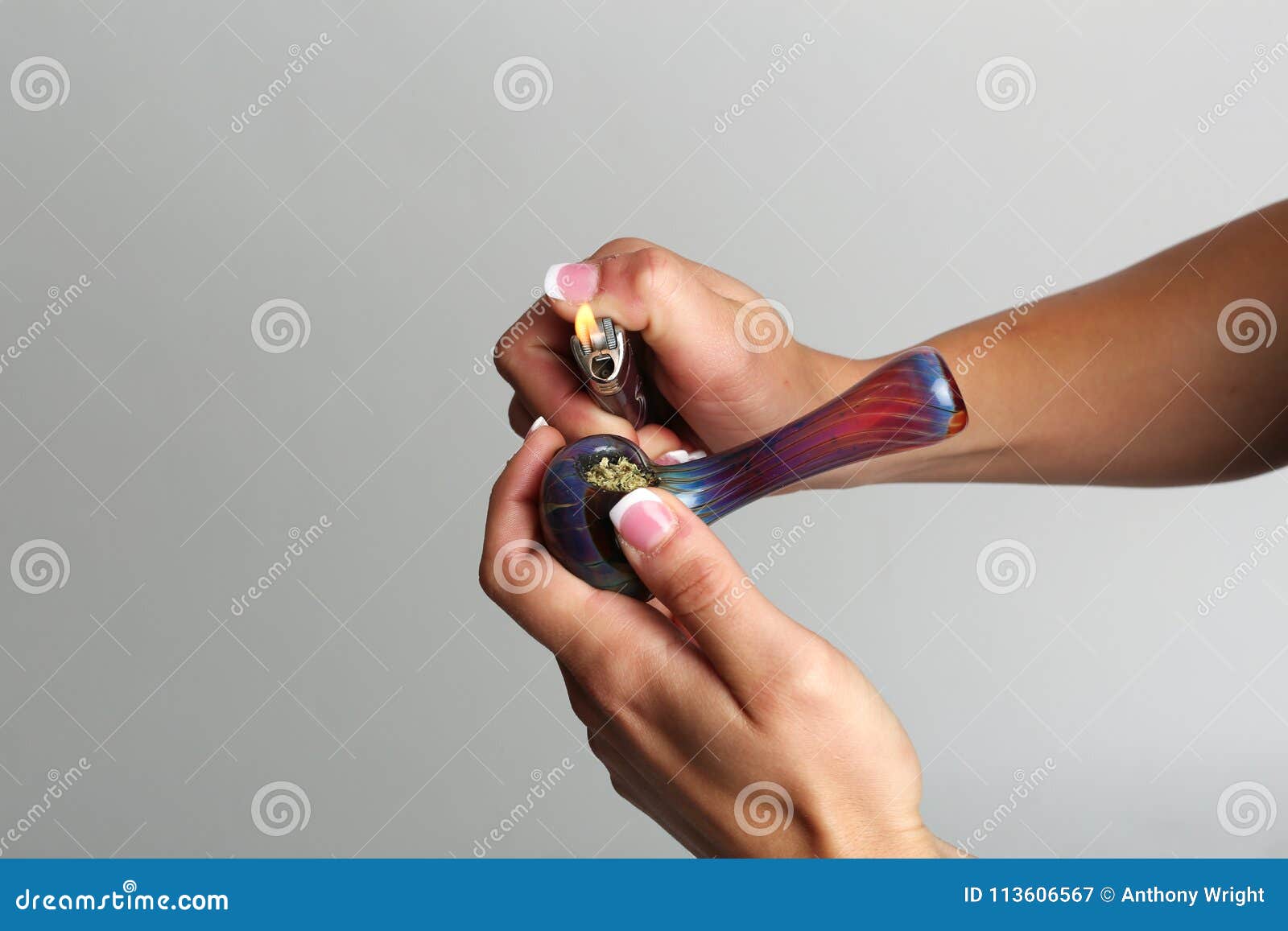 Marijuana pipe in a hand stock image. Image of weed - 113606567