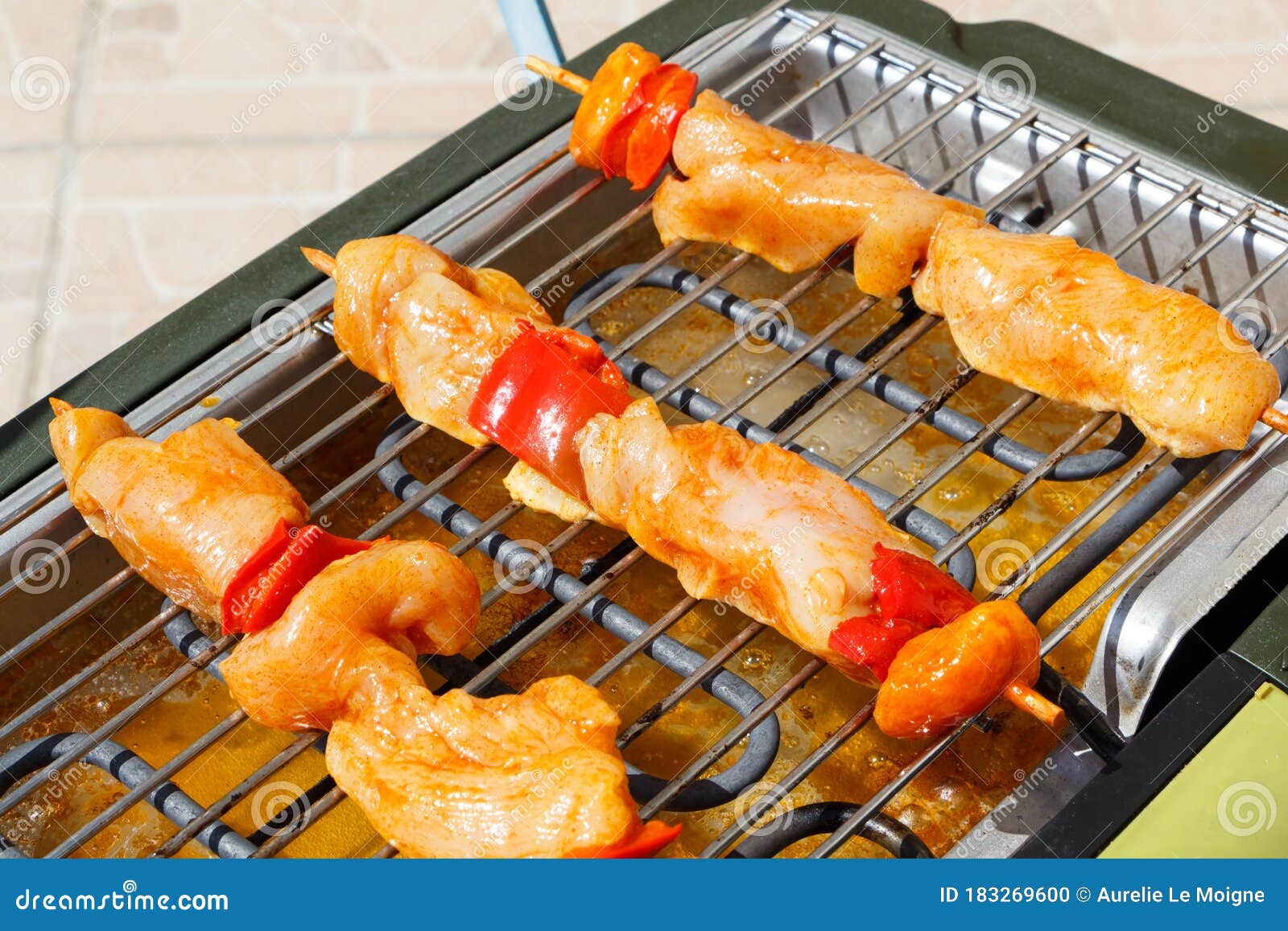 Marinated Chicken Brochette on Electric Barbecue Stock Photo - Image of ...