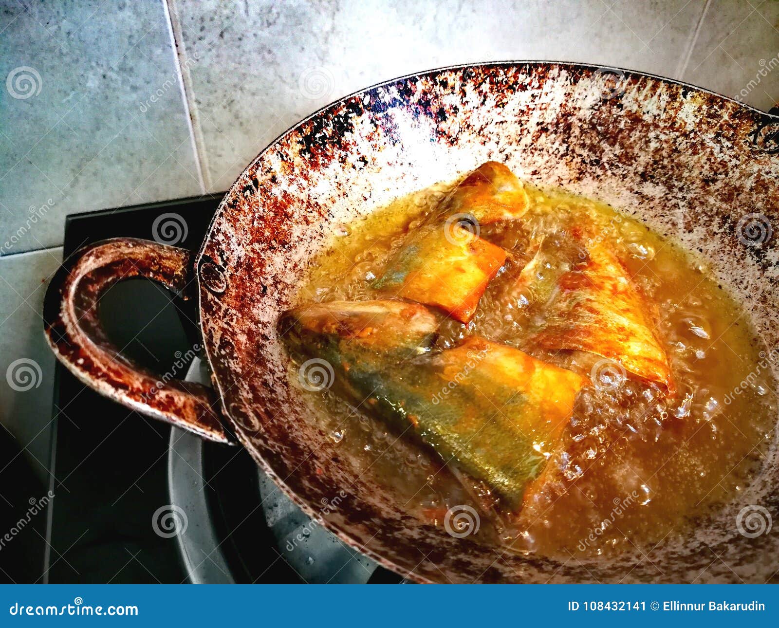 Marinated Fish with Seasoning is Fried in a Pan. Stock Image - Image of ...