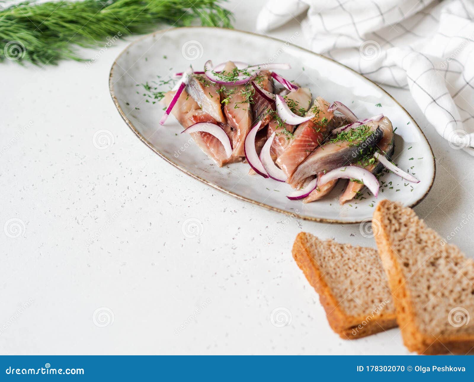 Marinated Herring Fish Slices with Fresh Dill and Red Onion, Rye Bread ...