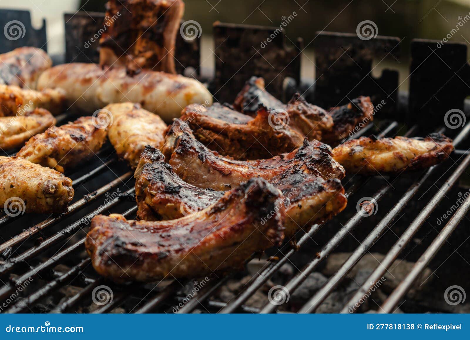 Marinated Meat, Chicken, Ribs and Sausages Put on the Barbecue Stock ...