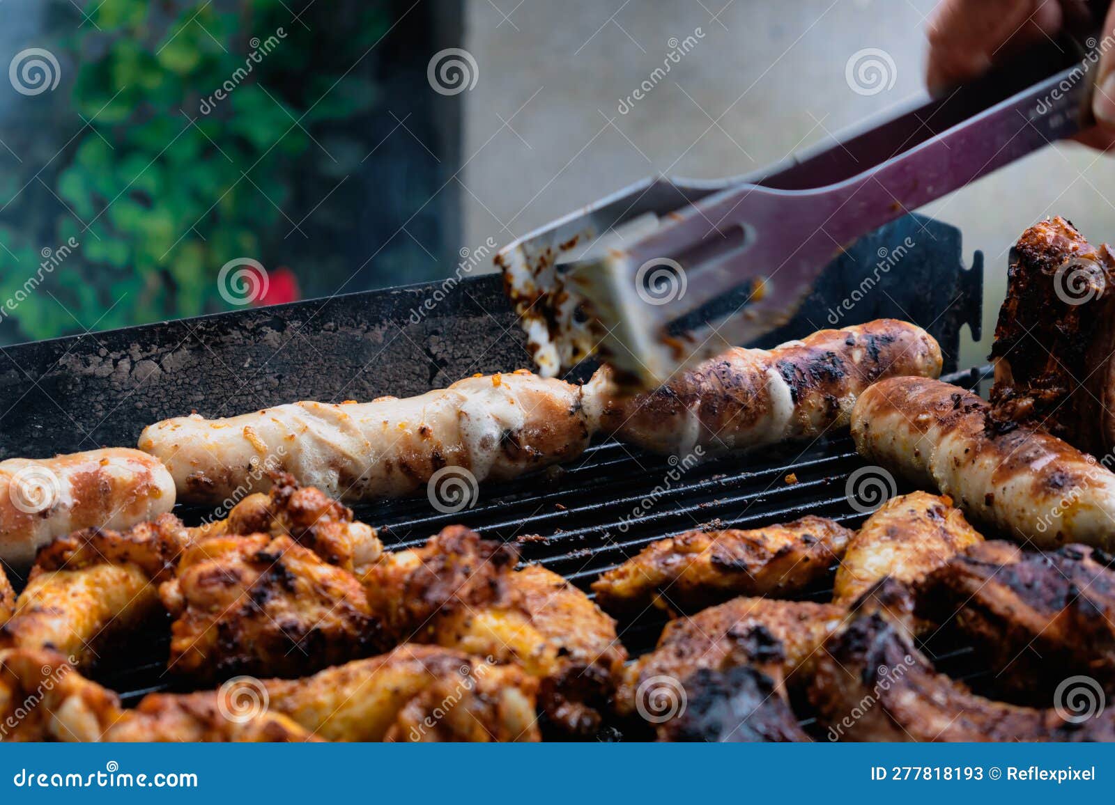 Marinated Meat, Chicken, Ribs and Sausages Put on the Barbecue Stock ...