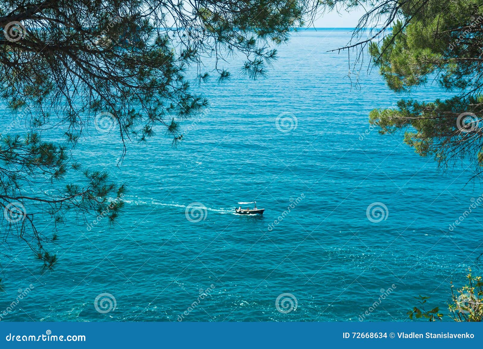 Marine Boat Floating on the Sea in the Distance. Stock Photo - Image of ...